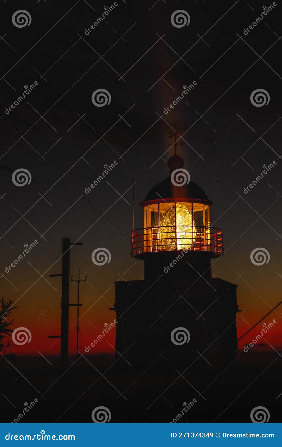 The Classic Lighthouse Silhouette during the Sunset, Dramatic Clouds in ...