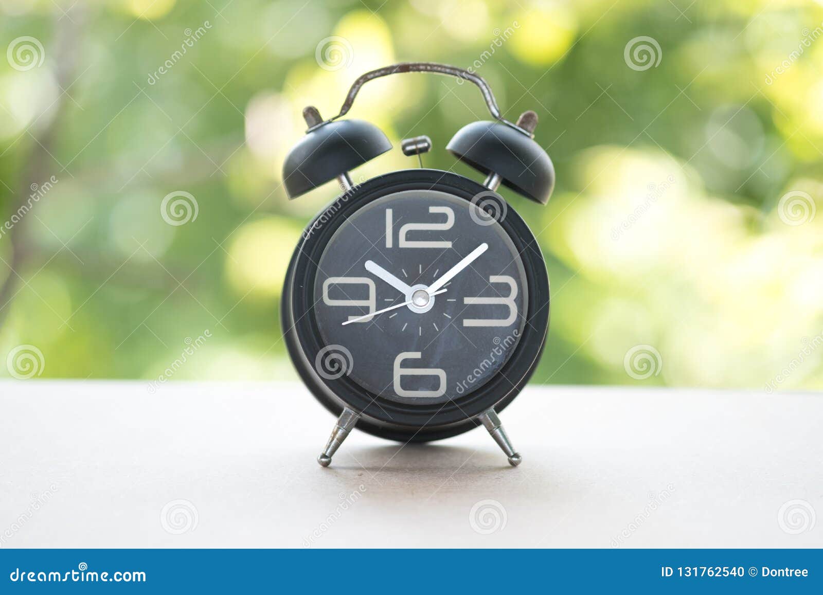 Classic Mechanical Bell Clock on Black Dotted Stock Photo - Image of ...