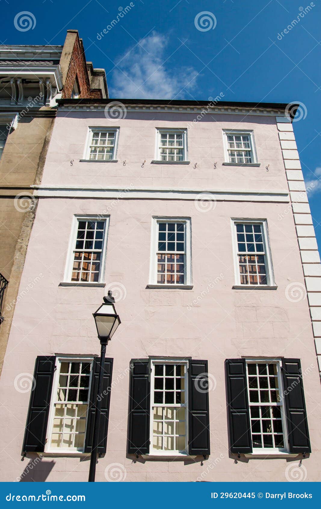 Classic Old Lampost by Pink Plaster Building Stock Image - Image of ...