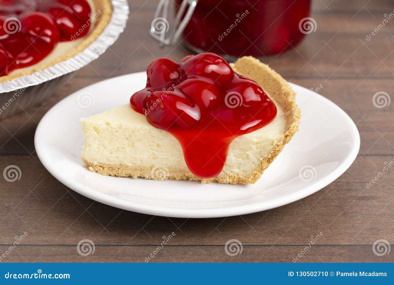 Classic Plain No Bake Cherry Cheesecake in a Graham Cracker Crust Stock ...