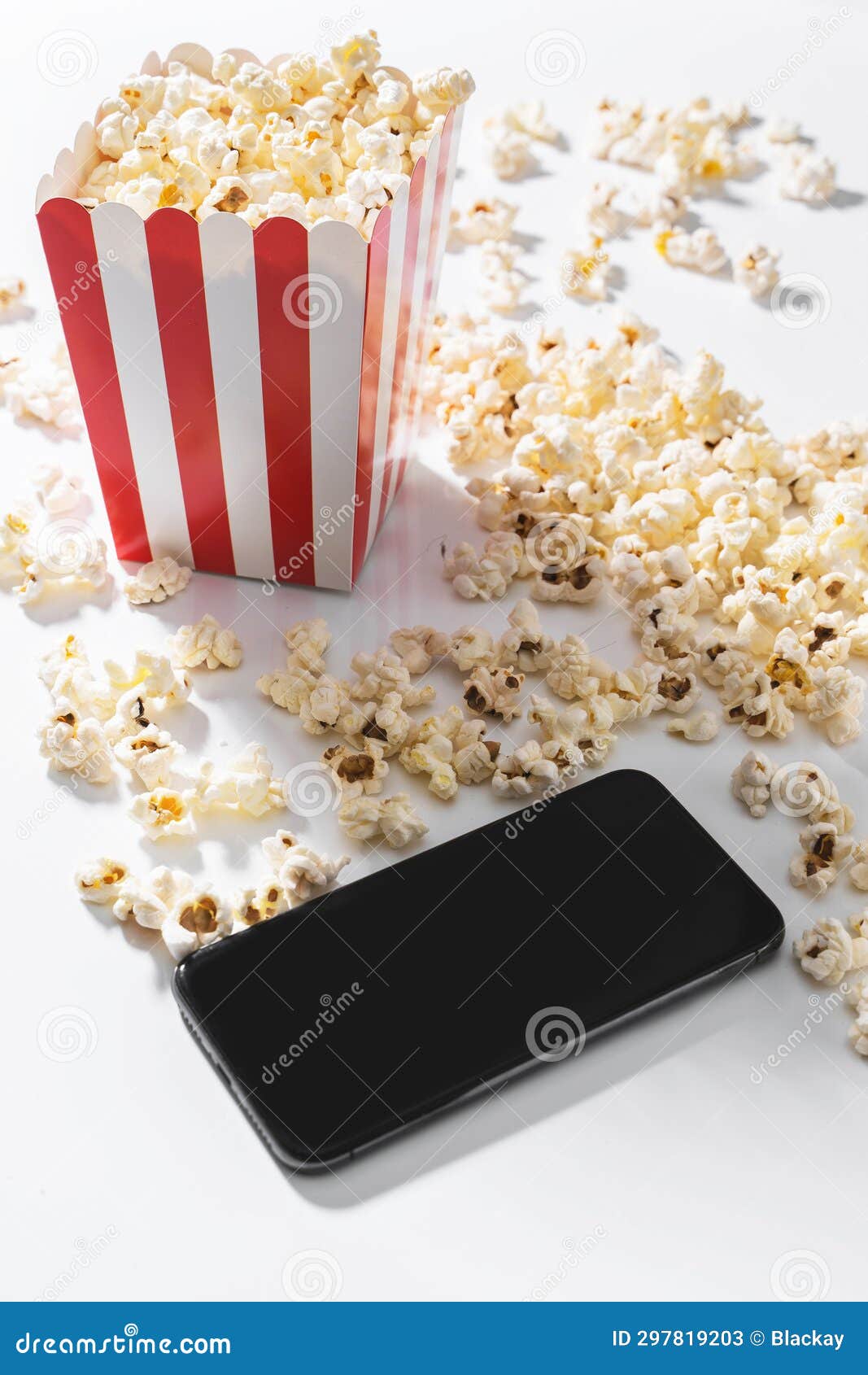 Classic Popcorn Bucket and Smartphone with Blank Screen on White ...