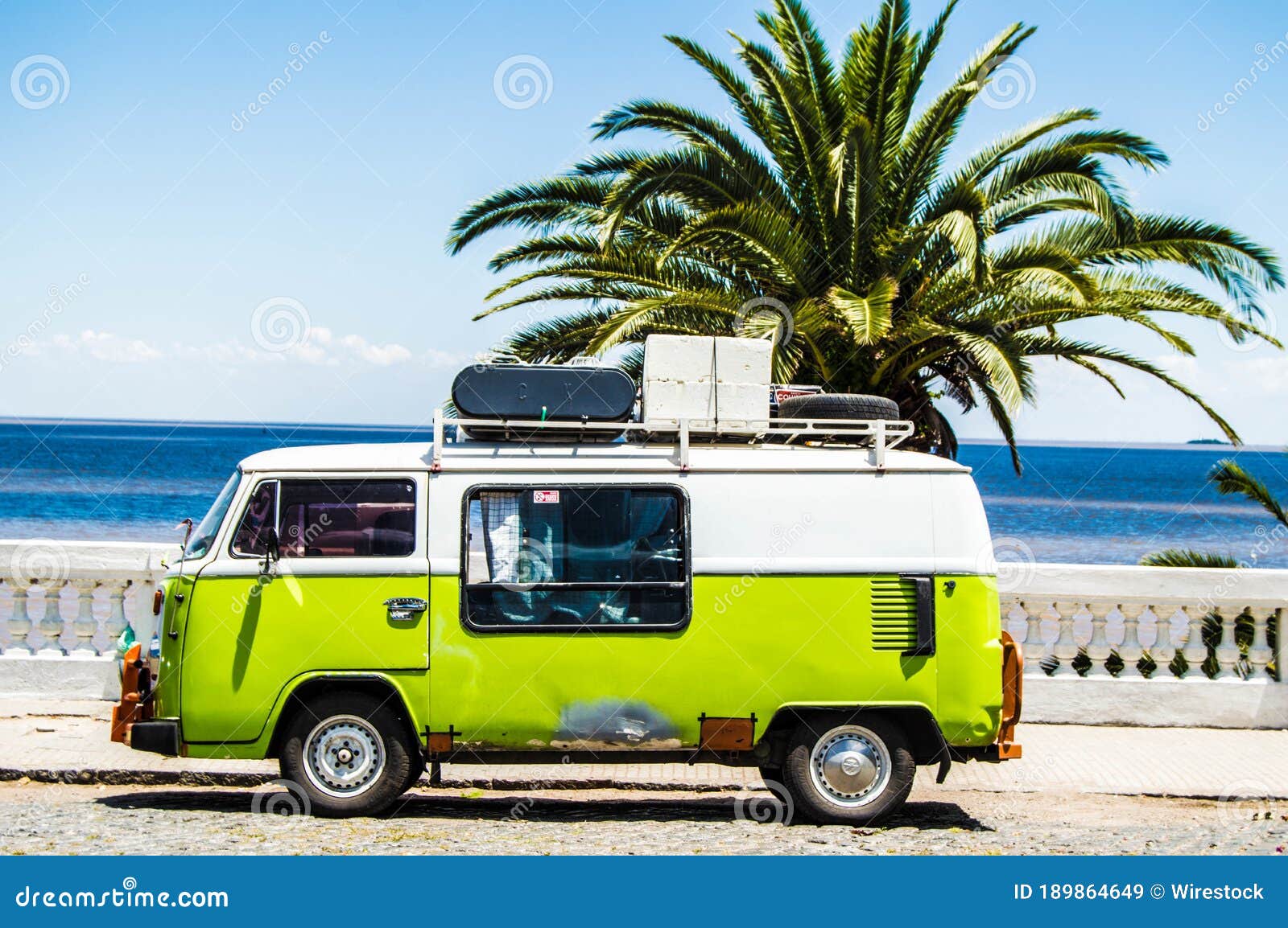 Classic Retro Camper Van Parked on a Tropical Beach on a Sunny Day ...