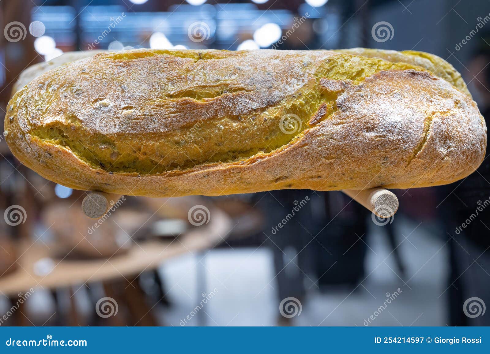 Classic Rustic Italian Loaf of Bread Resting on a Transparent Glass ...