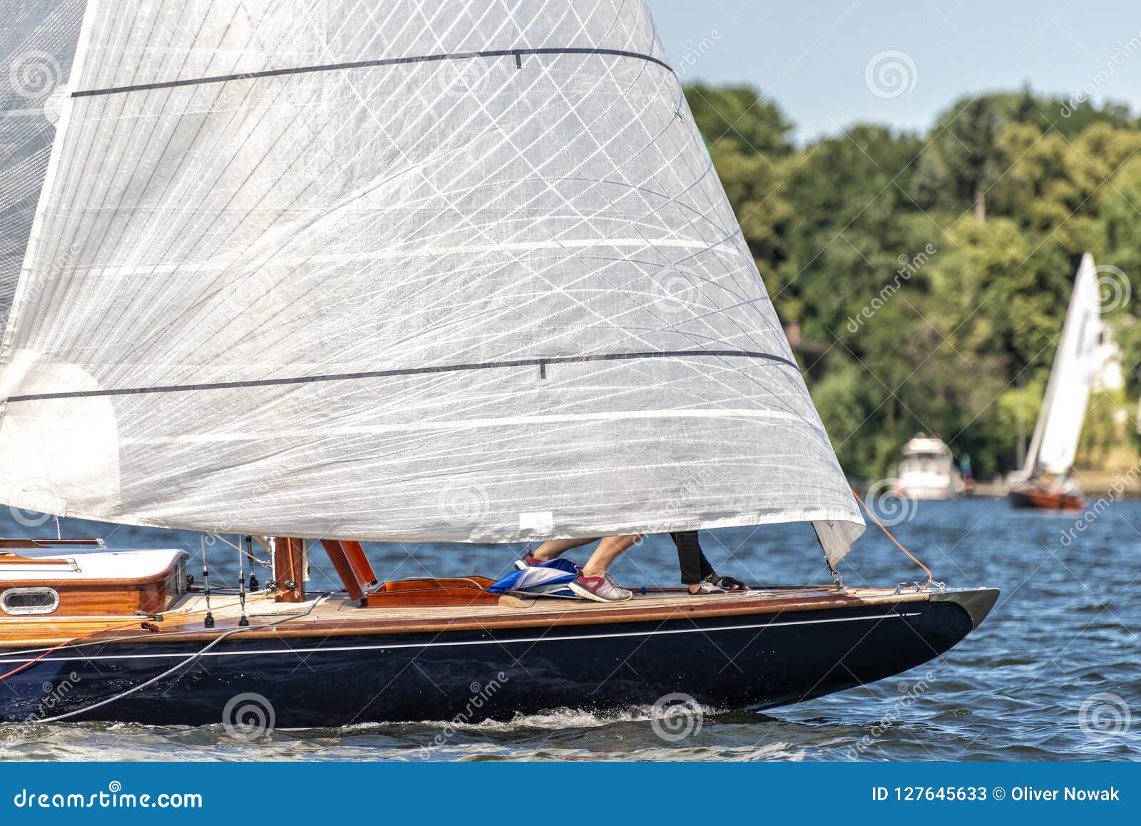 Classic Sailing Yacht with Spinnaker on a Lake in a Regatta Stock Image ...