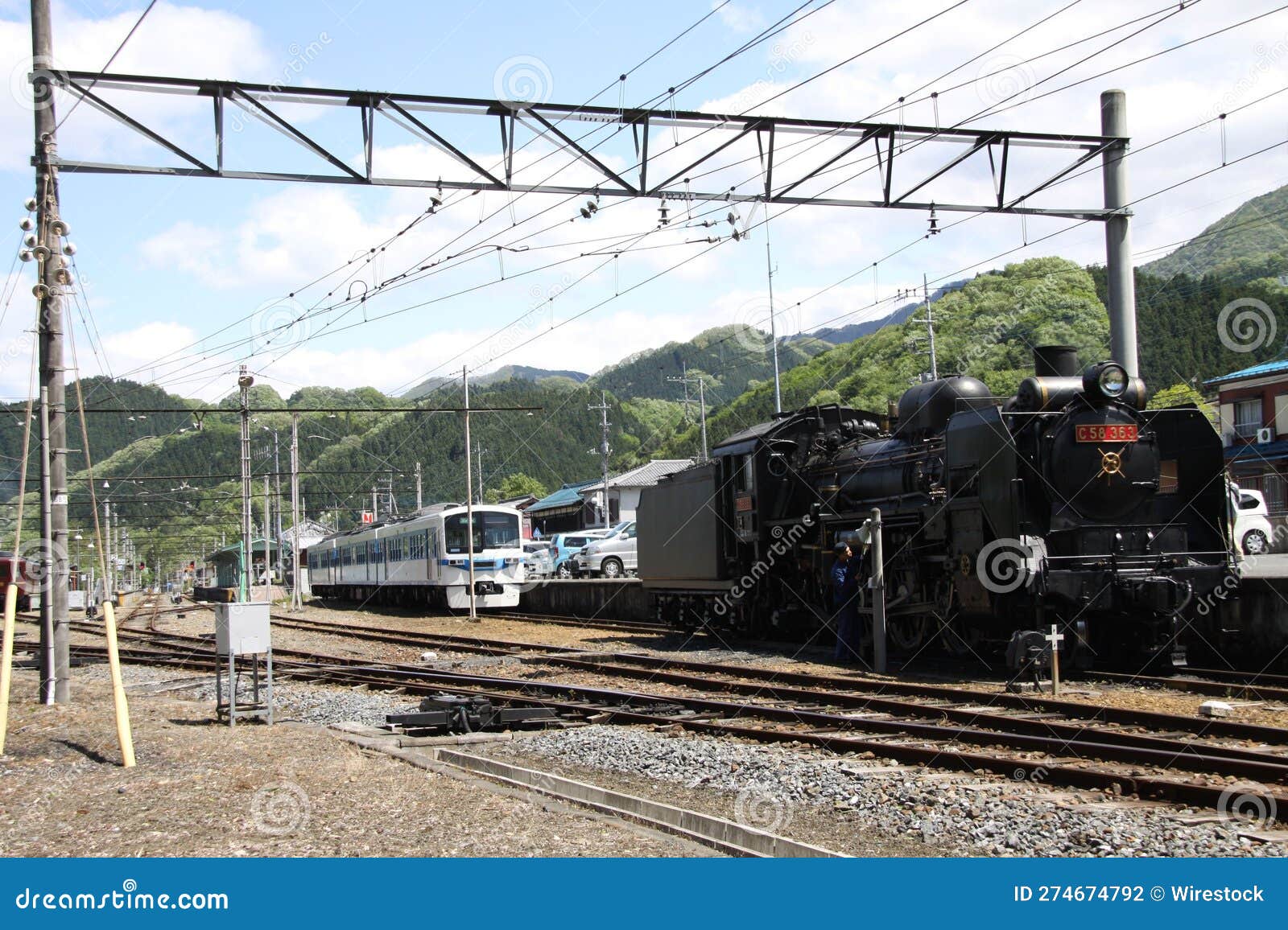 Classic Steam Locomotive Passenger Train is Seen at the Station Stock ...
