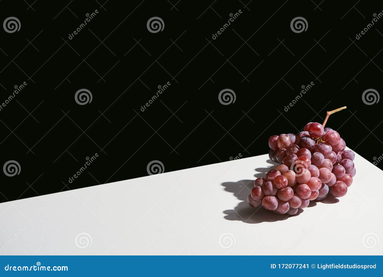 Classic Still Life with Grape with Shadow on White Table Isolated on ...