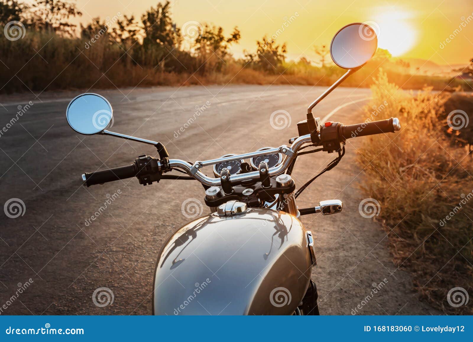 Classic Style Motorcycle on Road with Sunset Stock Photo - Image of ...