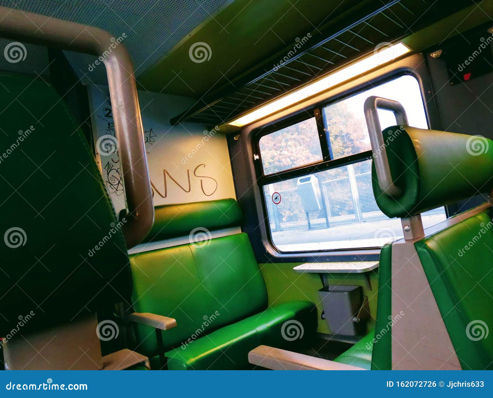 Classic Train Wagon with Green Seats, Inside a Passenger Train. Stock ...