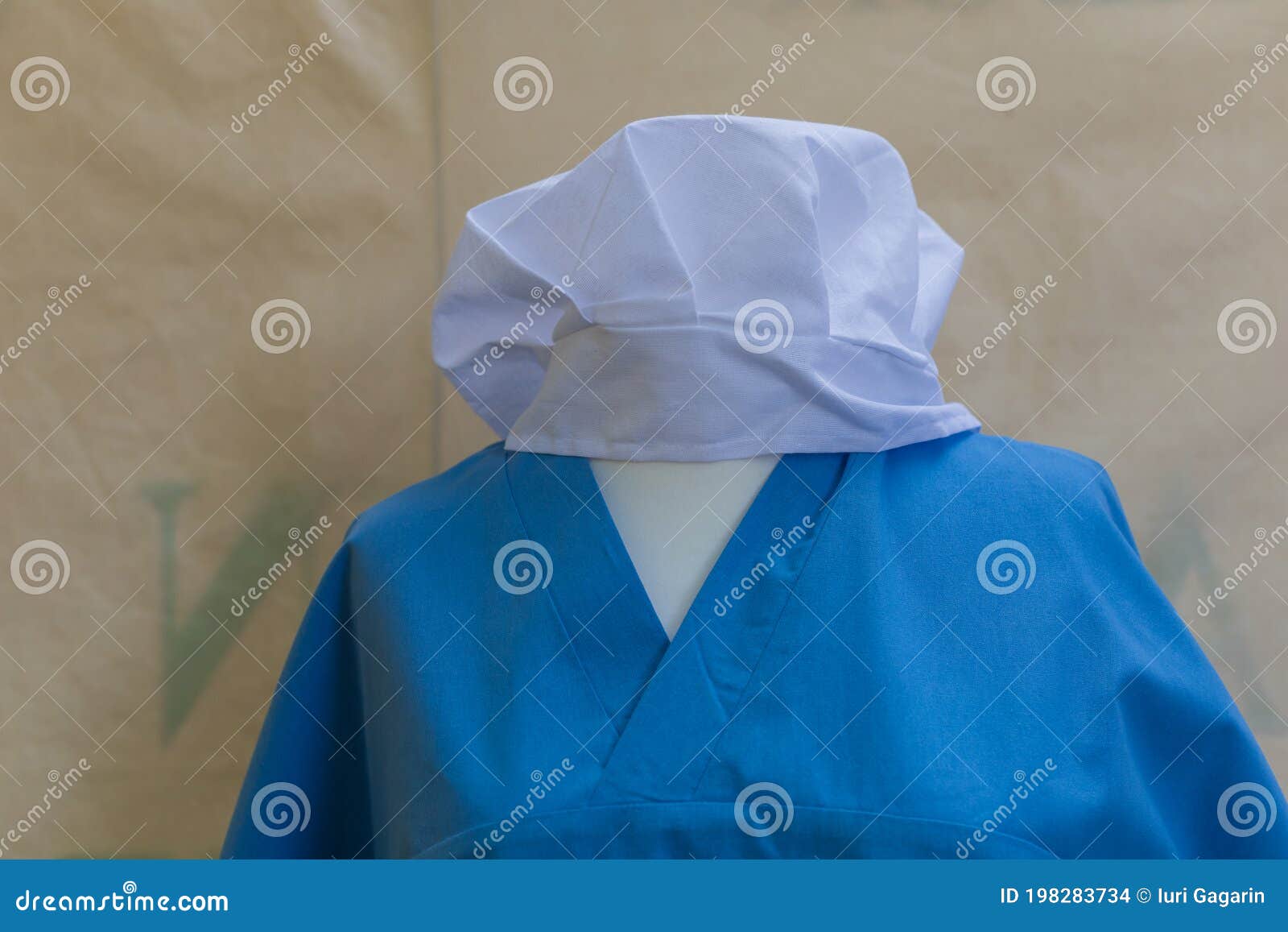 A Classic Typical Chef`s Workwear Suit on a Mannequin. Background with ...