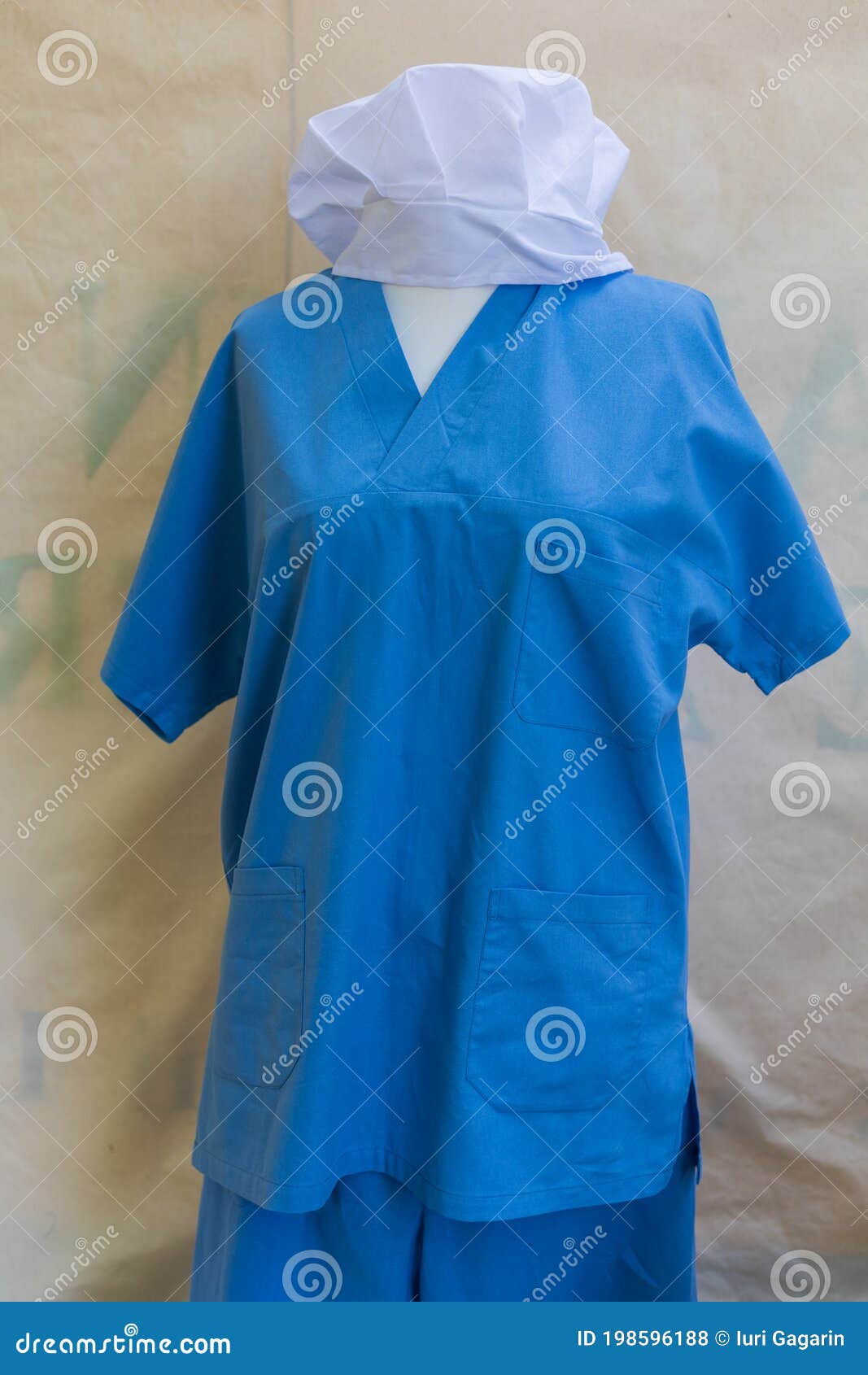 A Classic Typical Chef`s Workwear Suit on a Mannequin. Background with ...