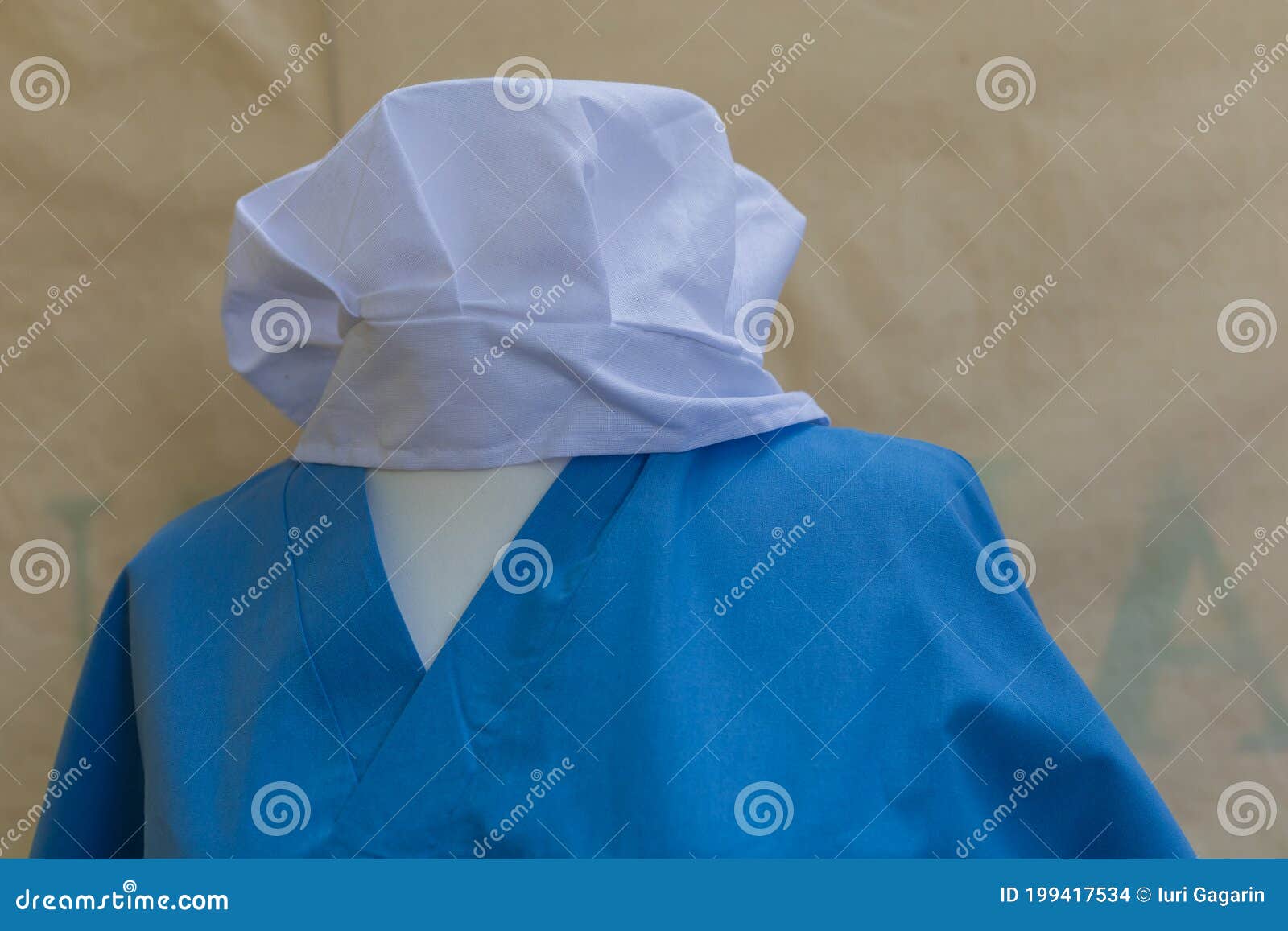 A Classic Typical Chef`s Workwear Suit on a Mannequin. Background with ...