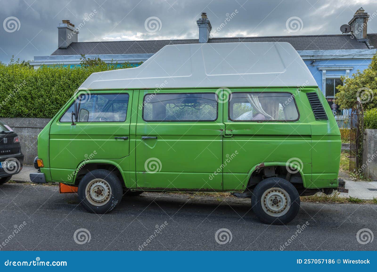 Classic VW Campervan in Green Color Editorial Photo - Image of street ...