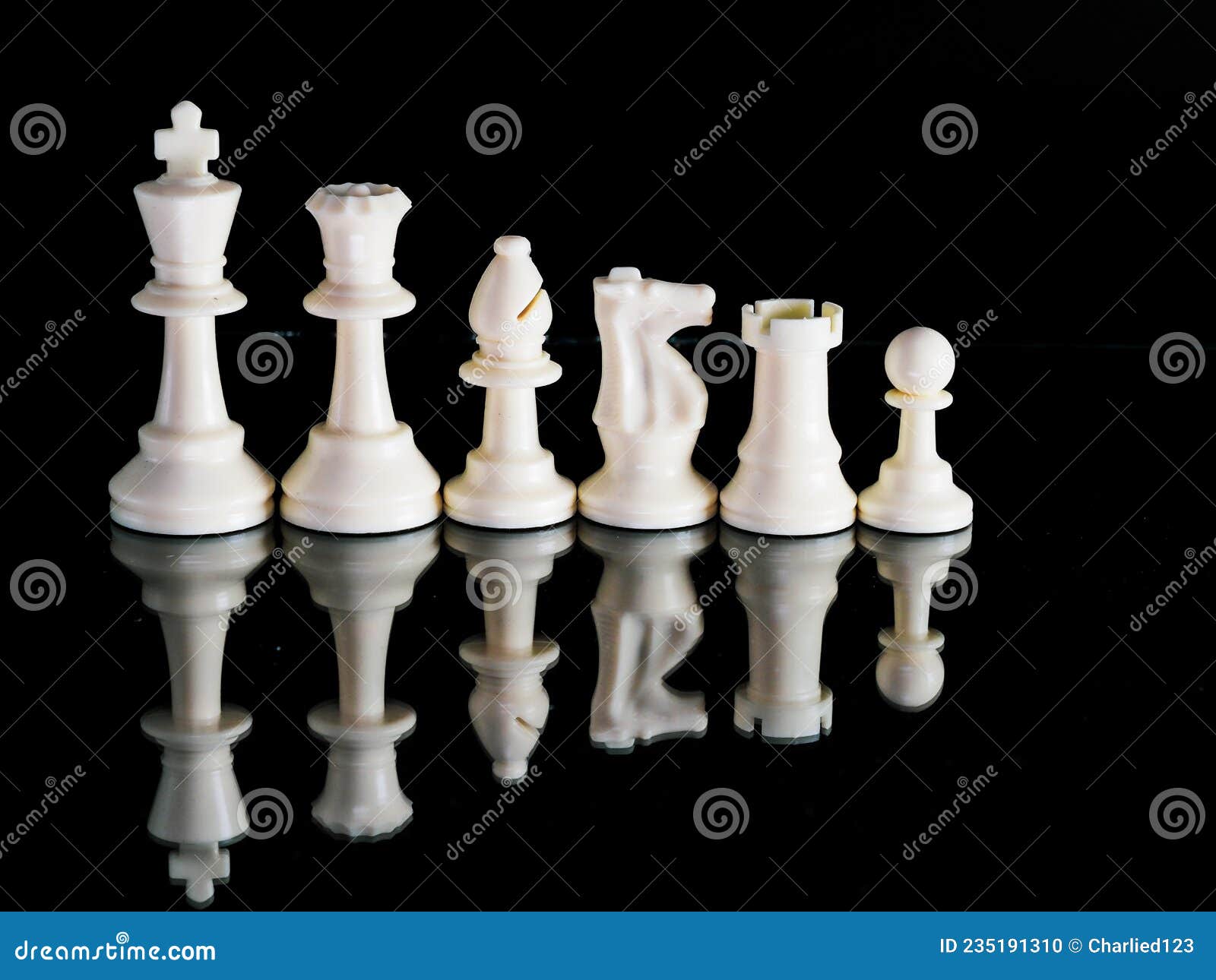 Classic White Chess Pieces on Black Background in Size Order Stock ...
