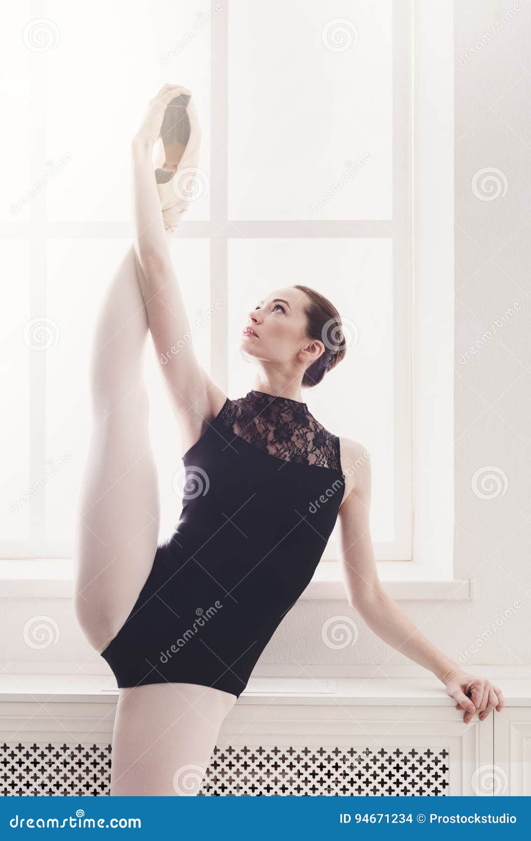 Classical Ballet Dancer in Split Stretching, Portrait Stock Photo ...