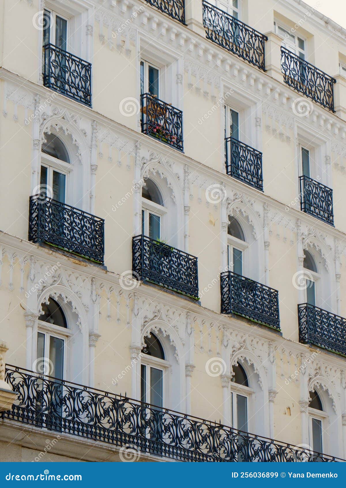 Classical Facade with Elegant Balconies and Windows Decorated with ...
