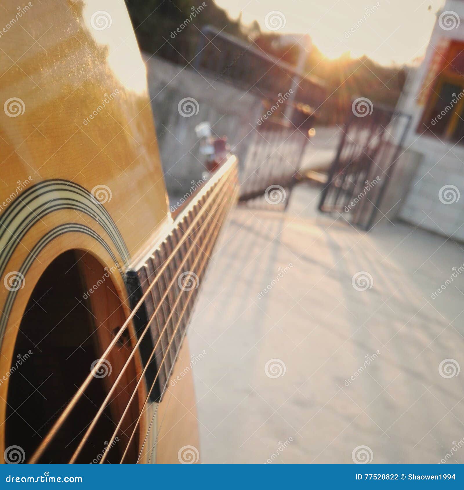 Classical guitar in sunset stock photo. Image of rock - 77520822