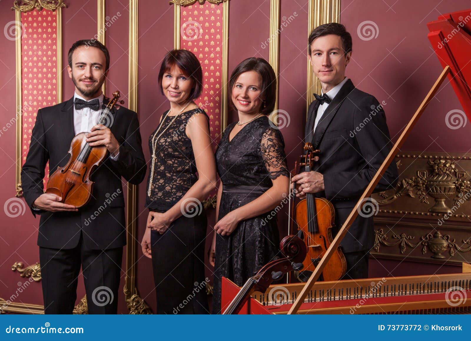 Classical Music Quartet Posing after the Concert. Stock Photo - Image ...