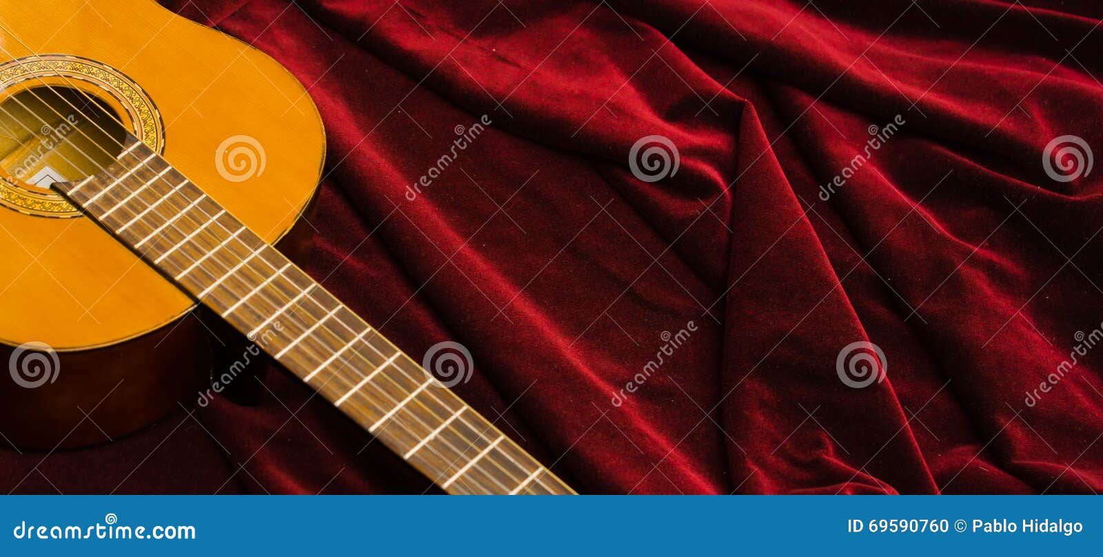 Classical Nylon Guitar Lying on Red Velvet Textile, Artistic Instrument ...