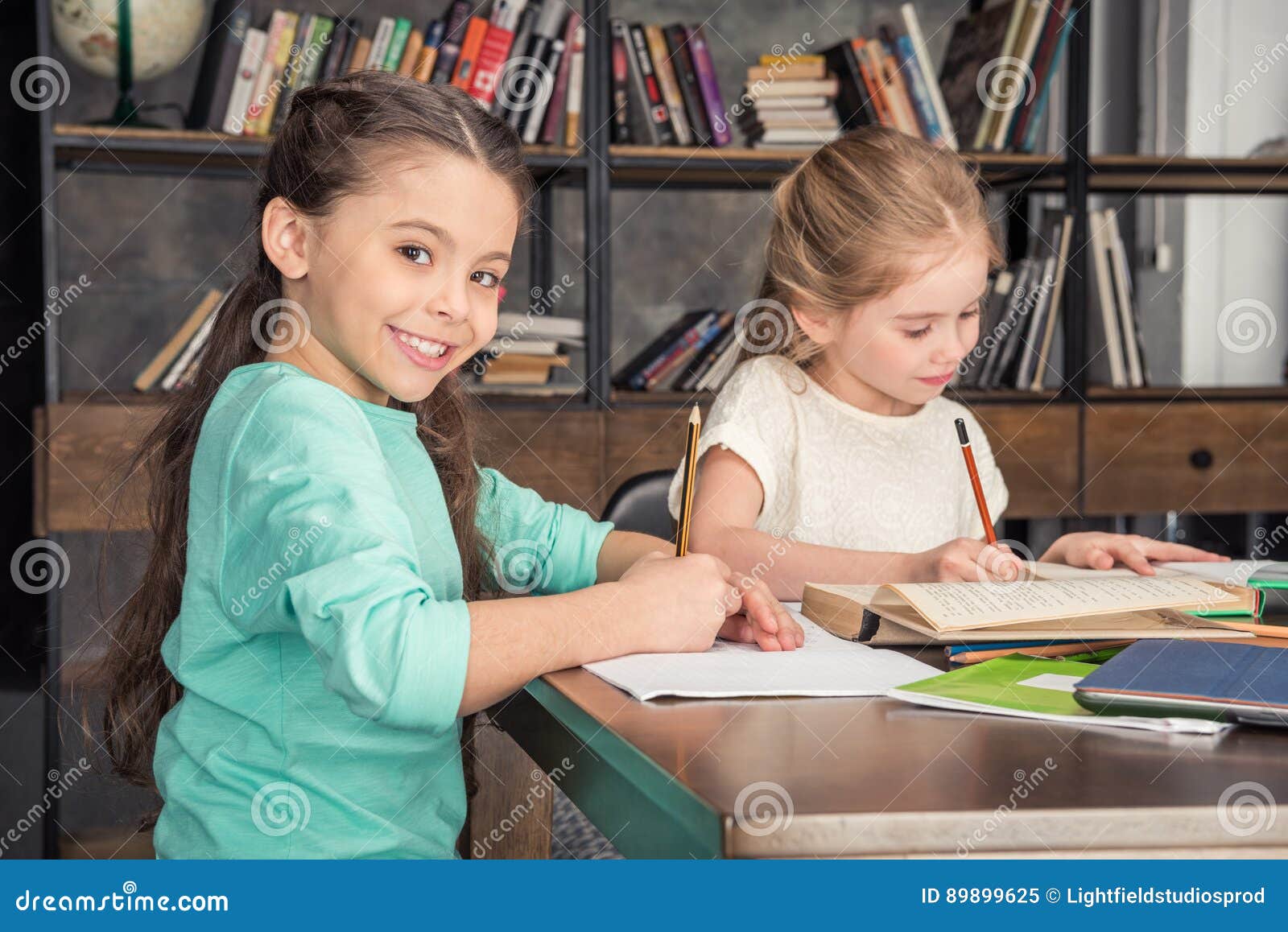 Classmates Doing Homework Together in Library Stock Image - Image of ...