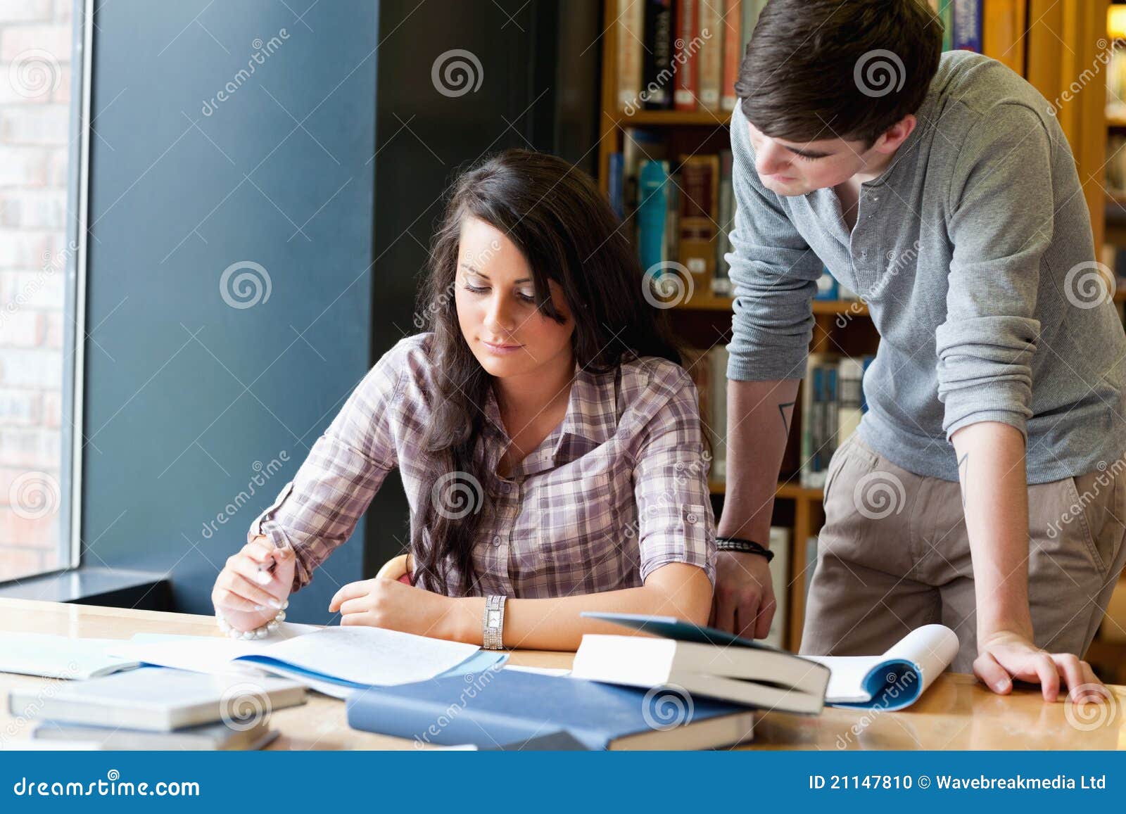 Classmates Helping Each Other Stock Photo - Image of knowledge ...