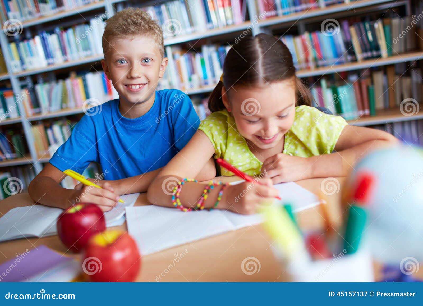 Classmates making notes stock image. Image of education - 45157137