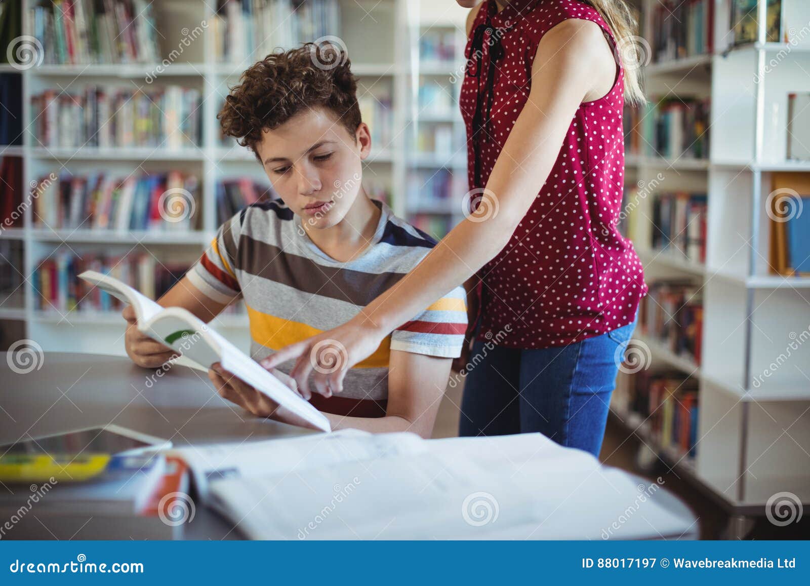 Classmates Reading Book in Library Stock Image - Image of friendship ...