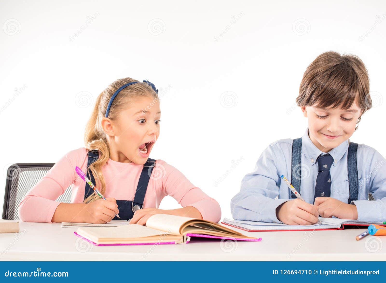 Classmates Sitting at the Table and Studying Together Stock Photo ...