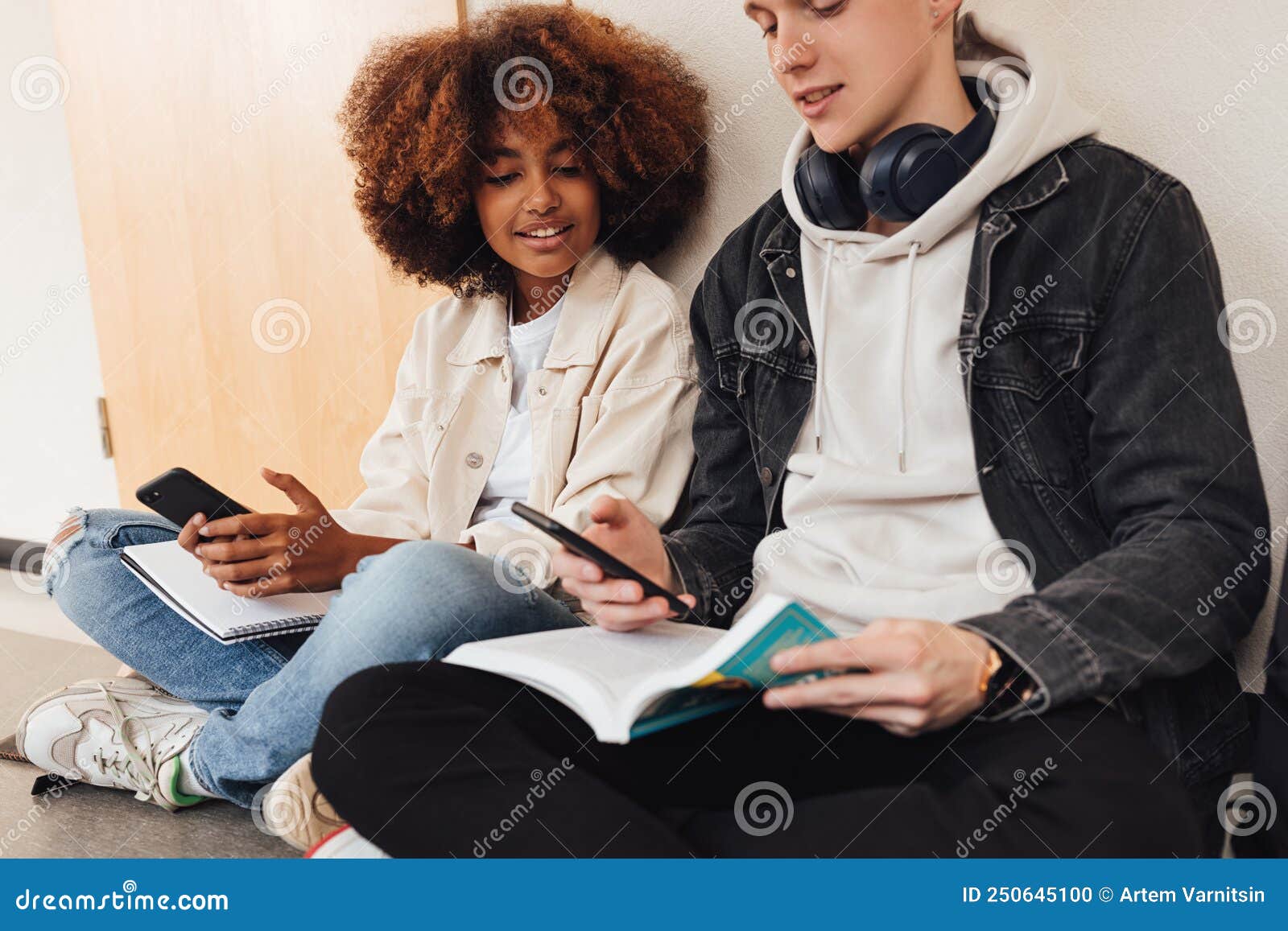 Classmates Sitting Together with Smartphones and Preparing Their ...