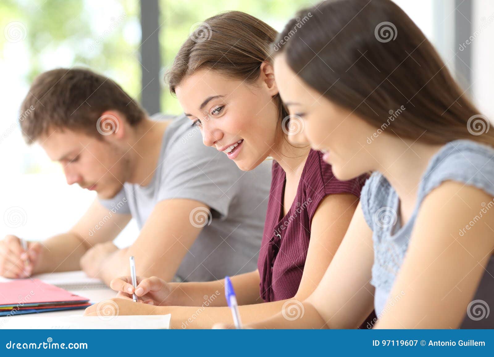 Classmates Talking during a Class in a Classroom Stock Image - Image of ...
