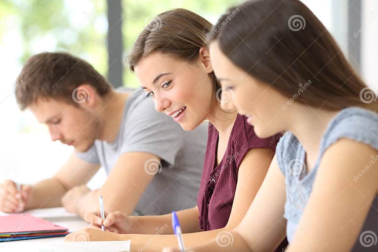Classmates Talking during a Class in a Classroom Stock Image - Image of ...