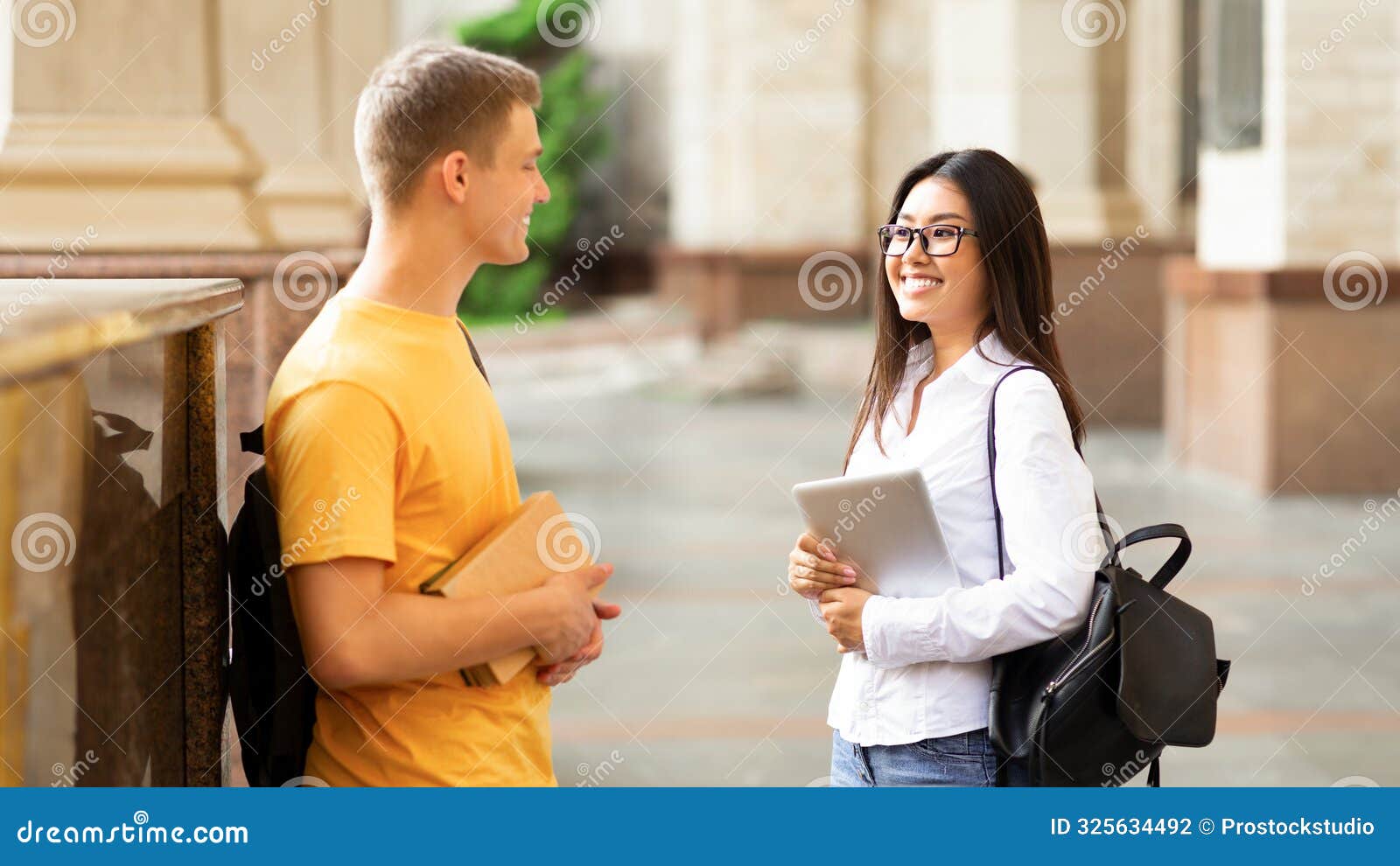 Classmates Talking in College Campus during Break Stock Photo - Image ...