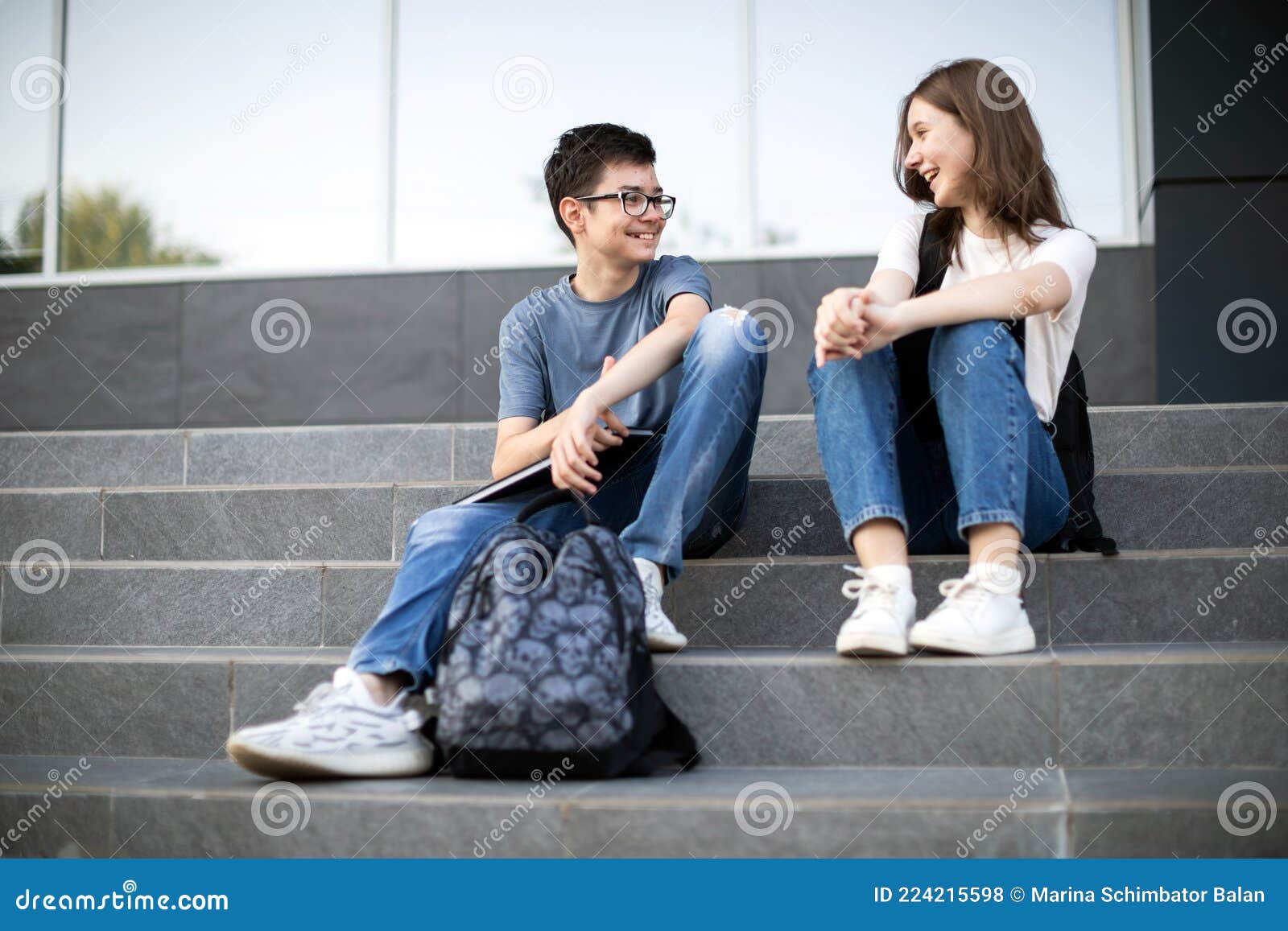 Classmates Talking on the Stairs of the School Stock Photo - Image of ...