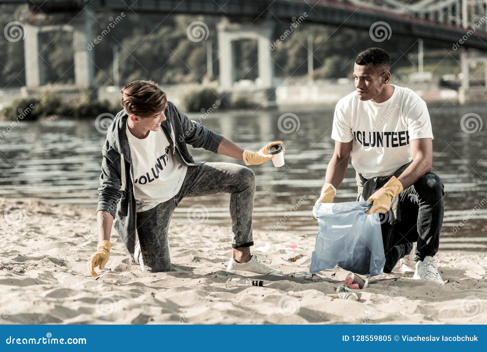 Classmates Talking To Each Other while Gathering Empty Coffee Cups on ... Classmates Talking To Each Other while Gathering Empty Coffee Cups on ...