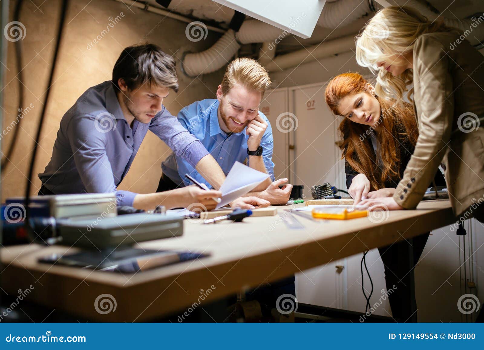 Classmates Working on a Project Together Stock Photo - Image of ... Classmates Working on a Project Together Stock Photo - Image of ...