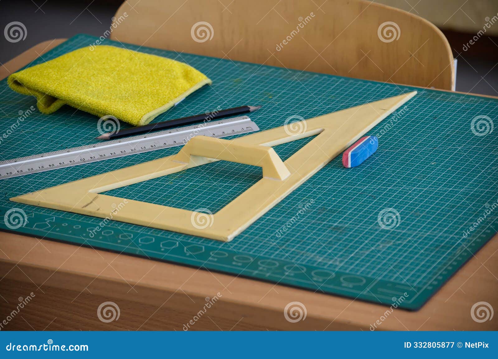 Classroom Desk with Math Tools, Ruler, and Eraser on a Cutting Mat ...