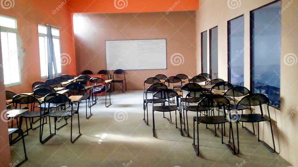 A Classroom Devoid of Students, with Vacant Chairs Neatly Arranged ...