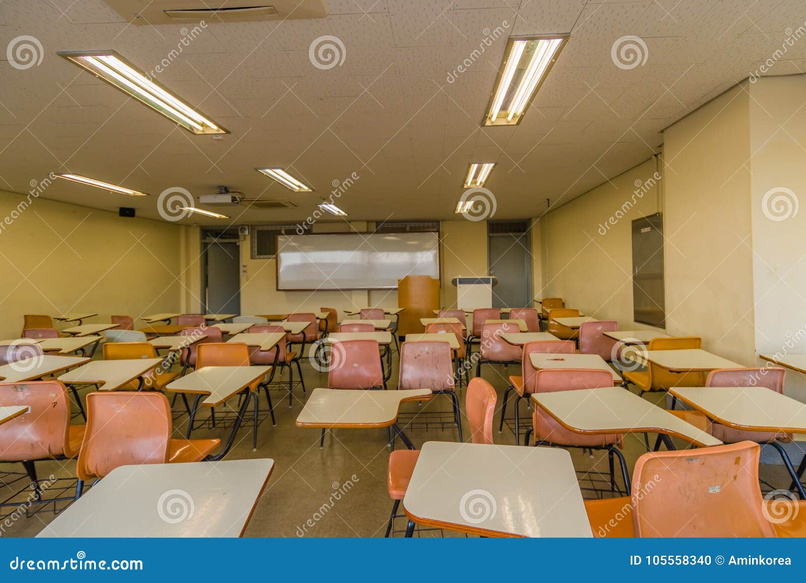 Classroom with Empty Desks with Large Whiteboard Stock Photo - Image of ...