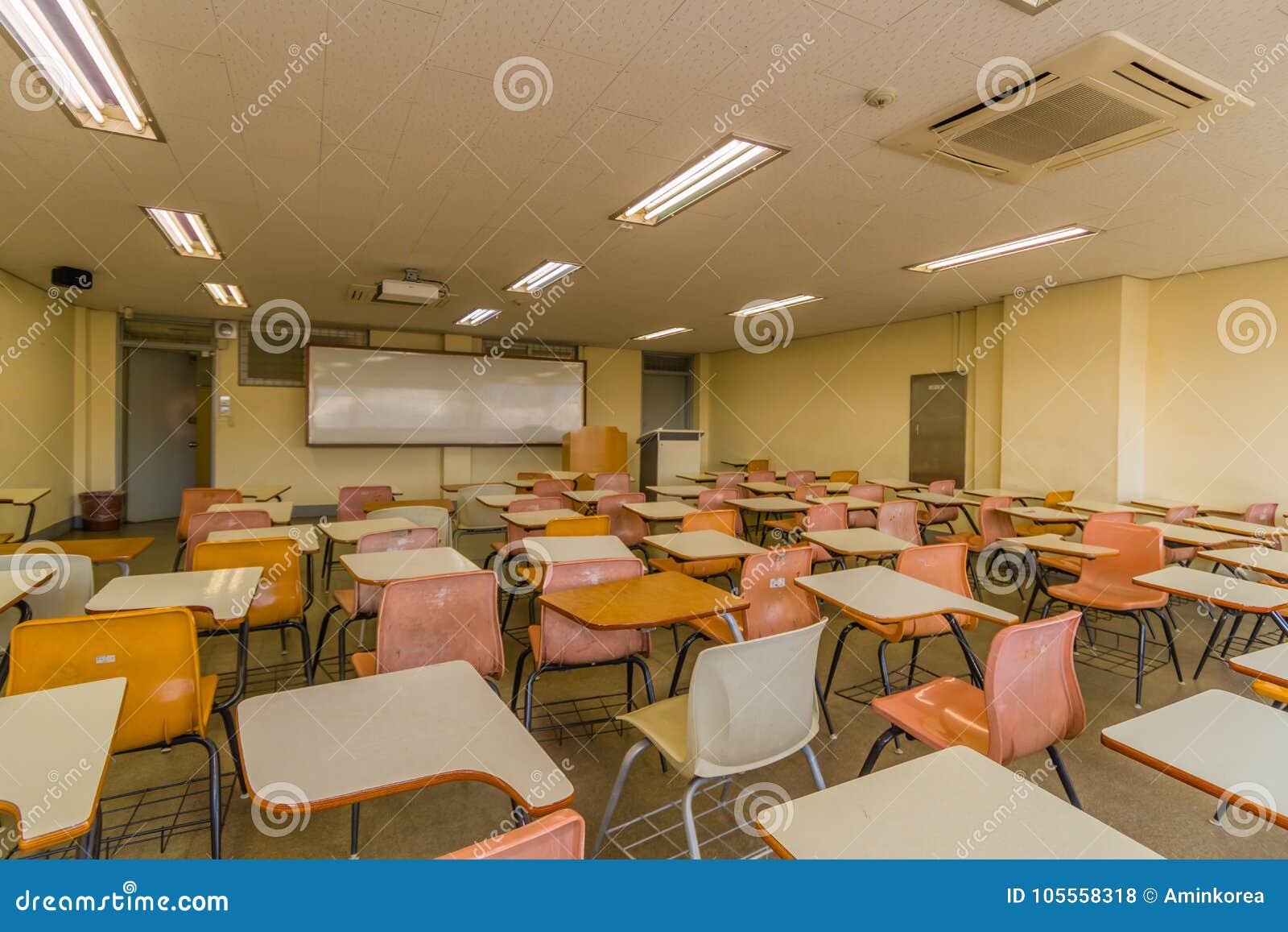 Classroom with Empty Desks with Large Whiteboard Stock Photo - Image of ...