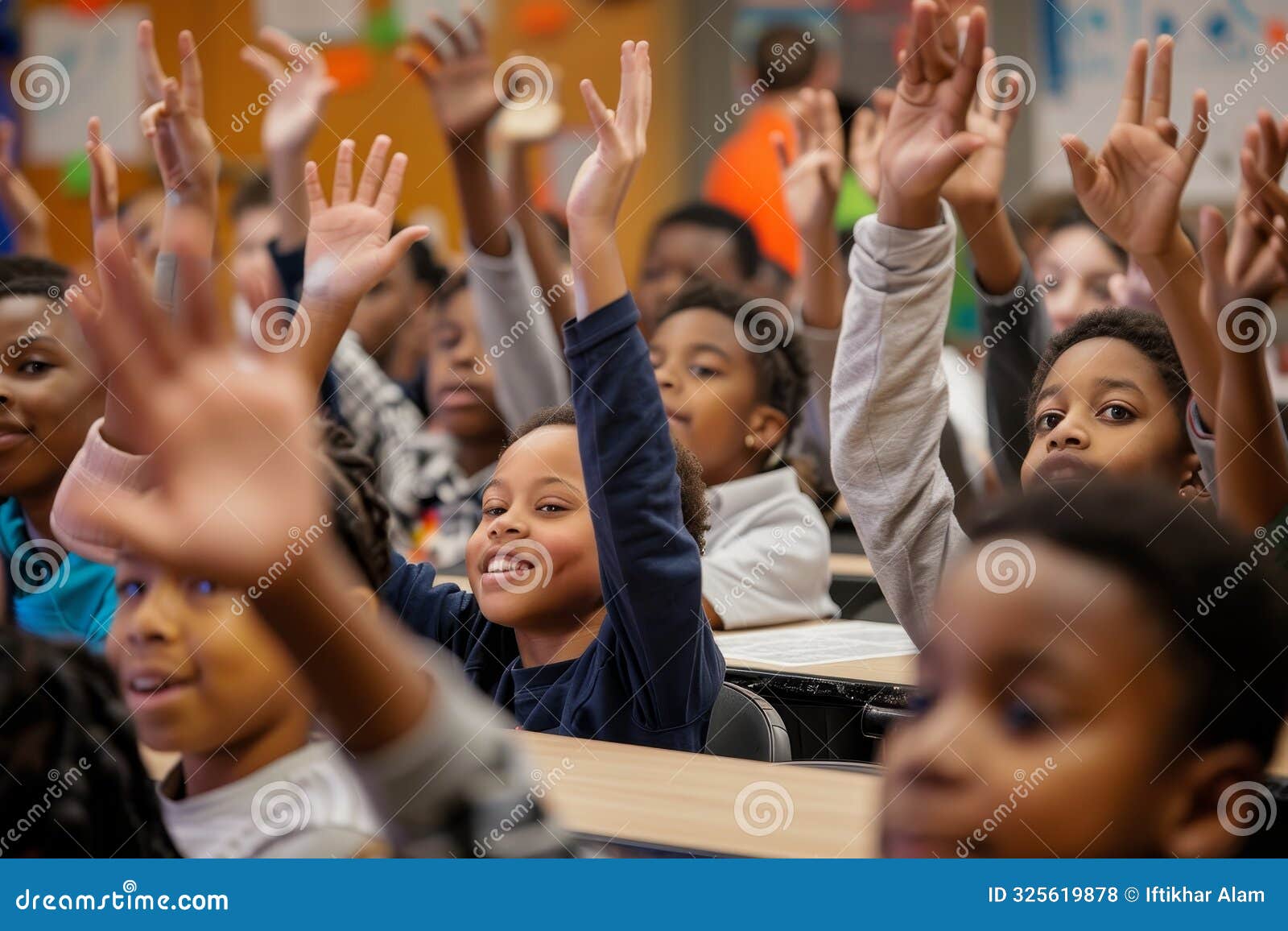 A Classroom Filled with Eager Elementary School Students Raising Their ...