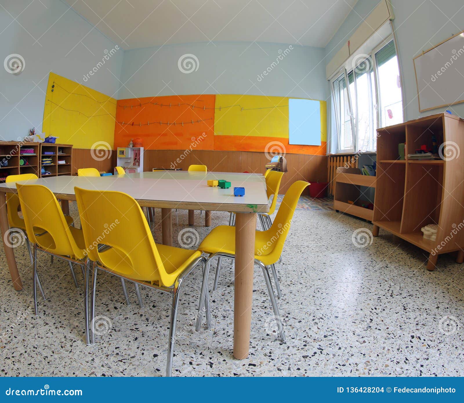 Classroom of a Kindergarten with Yellow Chairs Stock Photo - Image of ...