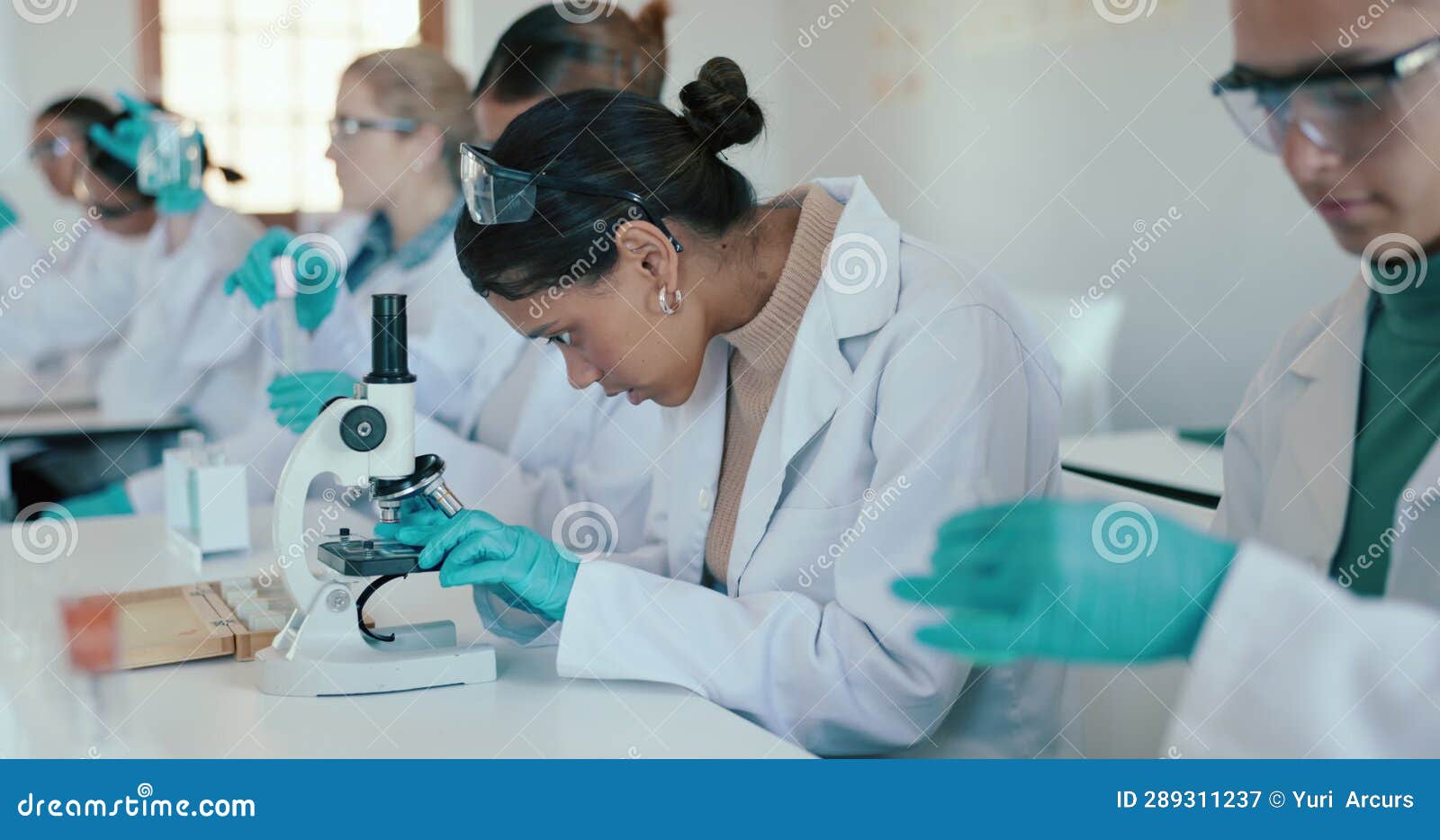 Classroom, Science and Students in Laboratory with Microscope for ...