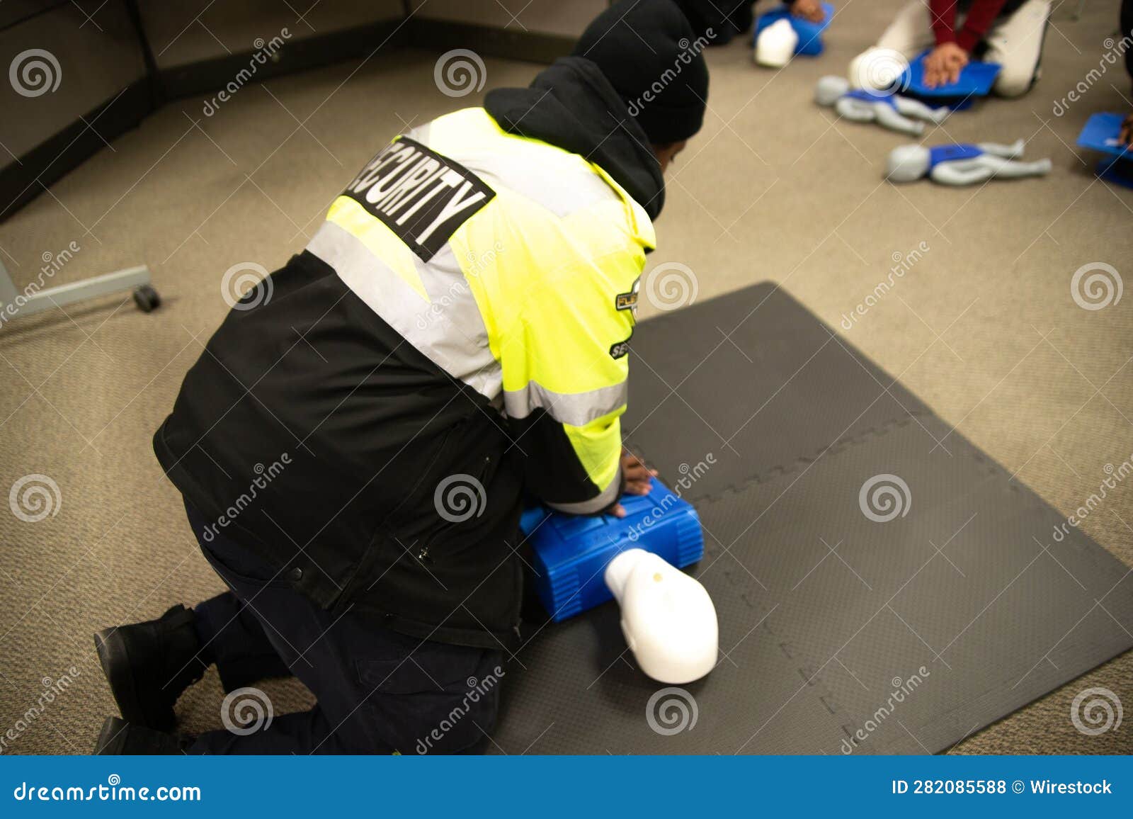 Classroom of Students Learning the Basics of First Aid with a Doll ...
