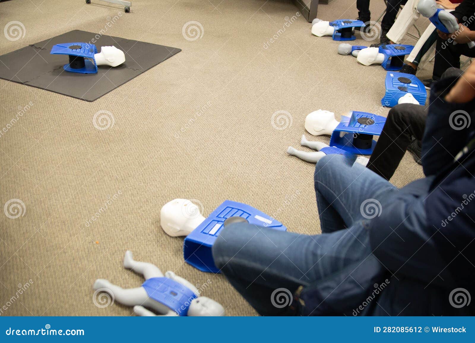 Classroom of Students Learning the Basics of First Aid with a Doll ...