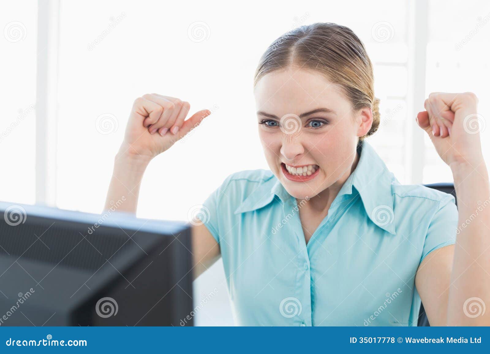 Classy Angry Businesswoman Sitting in Front of Computer Stock Photo ...