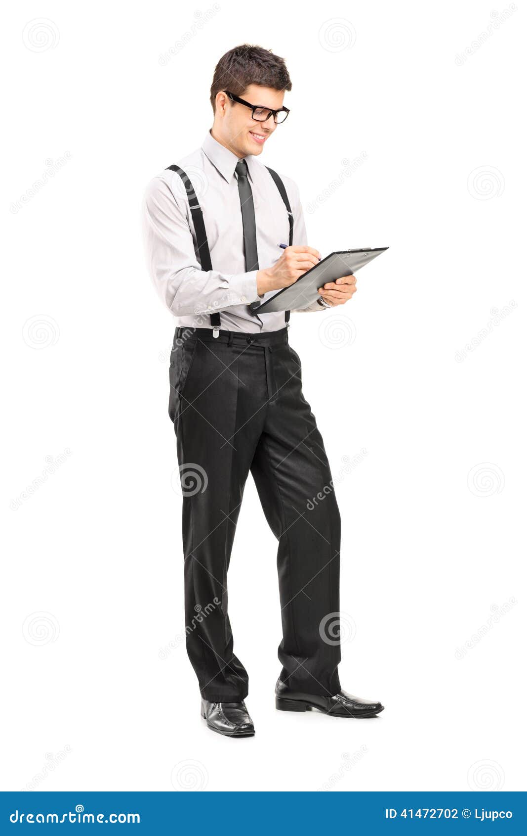 Classy Man Writing on a Clipboard Stock Photo - Image of file, fashion ...