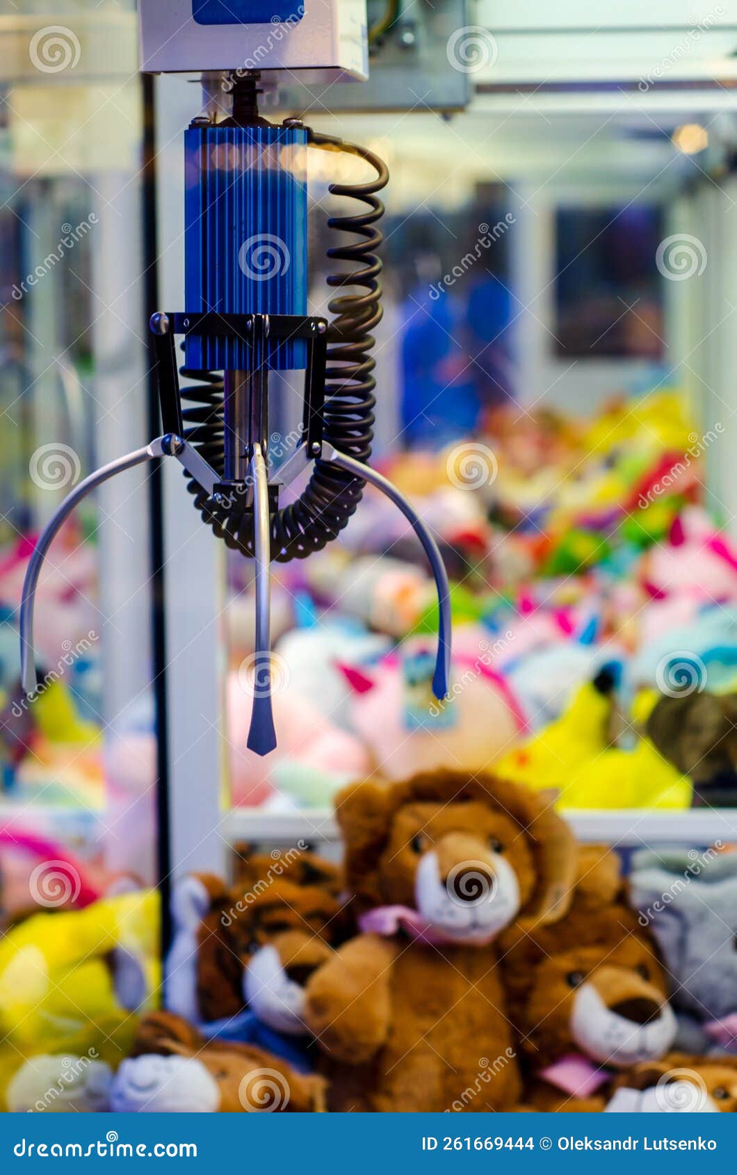 A Claw Crane Game Machine with Toys Stock Photo - Image of merchandiser ...