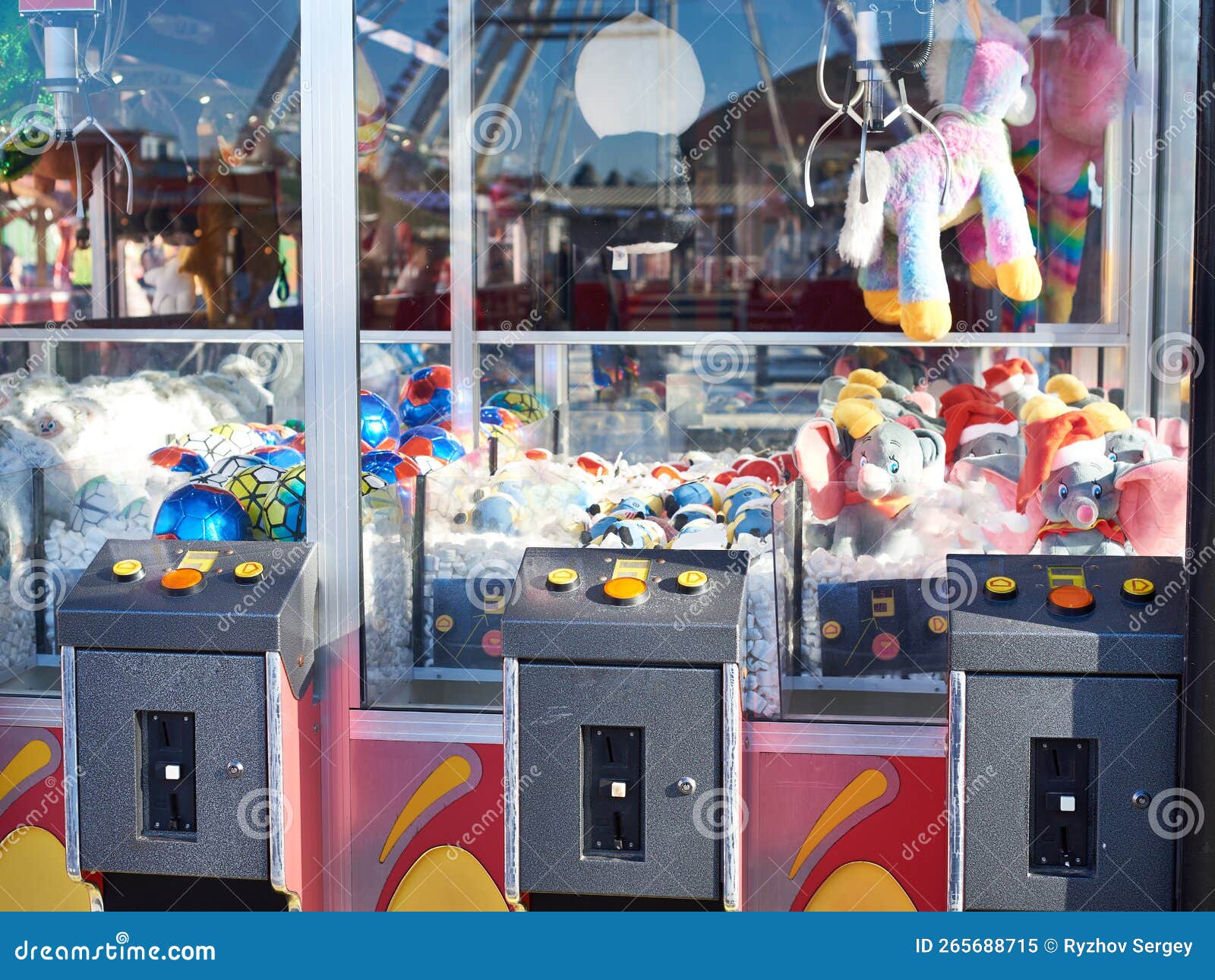 Claw toy cranes at fair stock image. Image of game, fair - 265688715