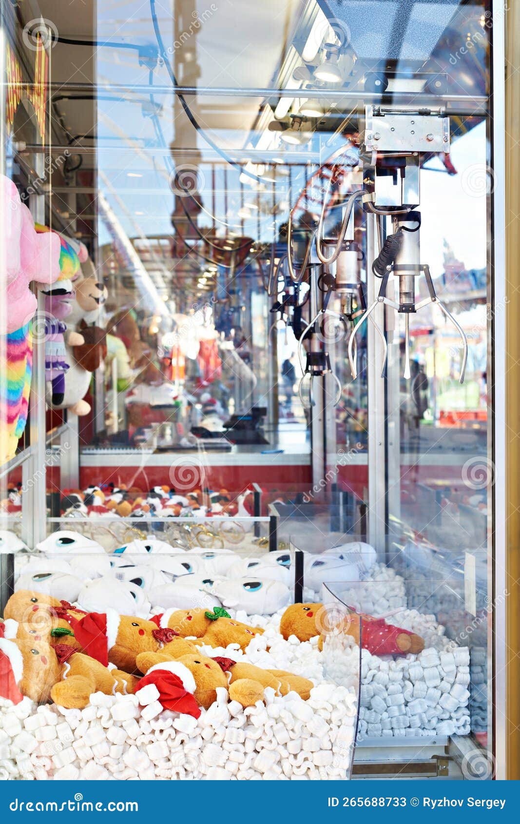 Claw toy cranes at fair stock image. Image of game, attraction - 265688733