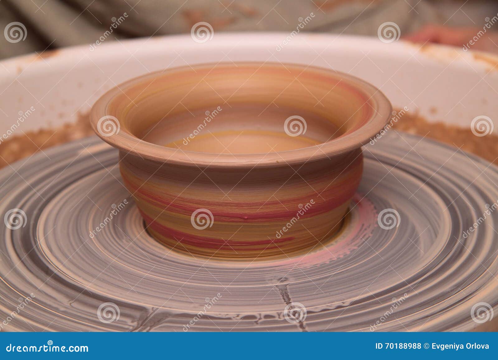 Clay pot on a potter wheel stock photo. Image of artist - 70188988