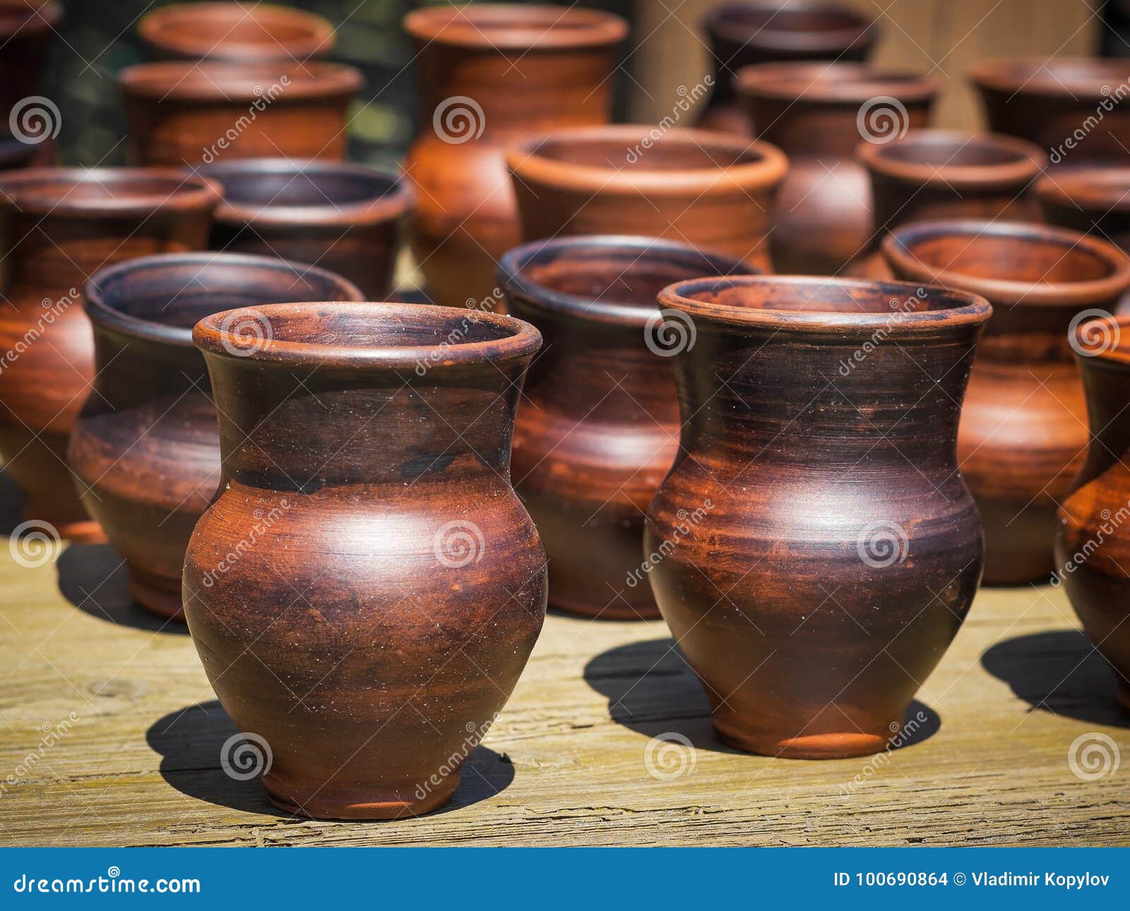 Clay Pots are Handmade on a Wooden Table in Sunlight. Stock Photo ...